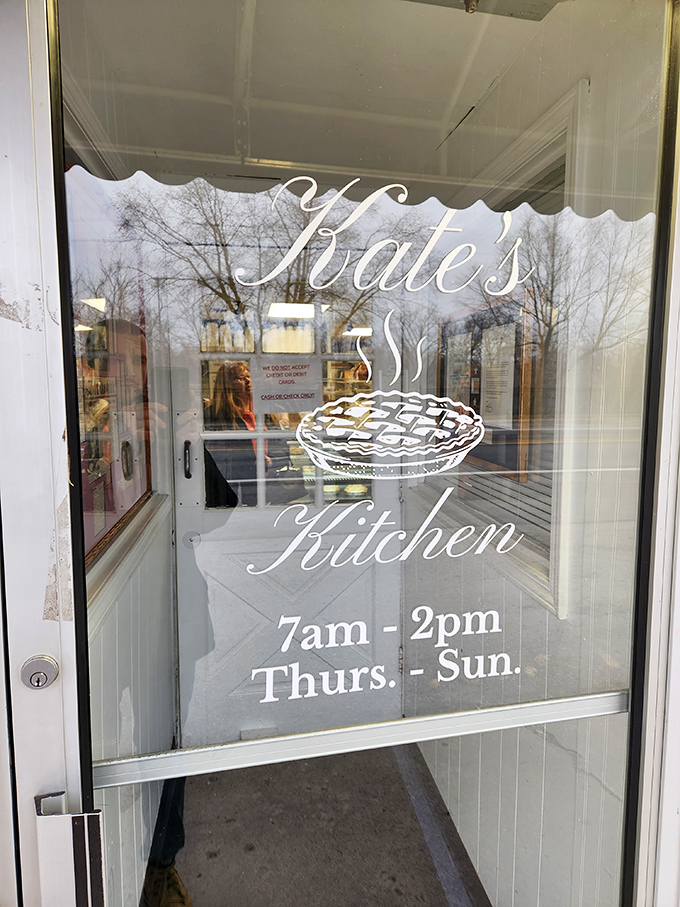 The door sign tells the story &ndash; limited hours that ensure quality over quantity, and a pie illustration that hints at the wonders waiting inside.