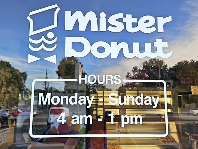 The iconic Mister Donut sign and hours – a beacon for early risers and a reminder that the best things in life keep traditional hours.