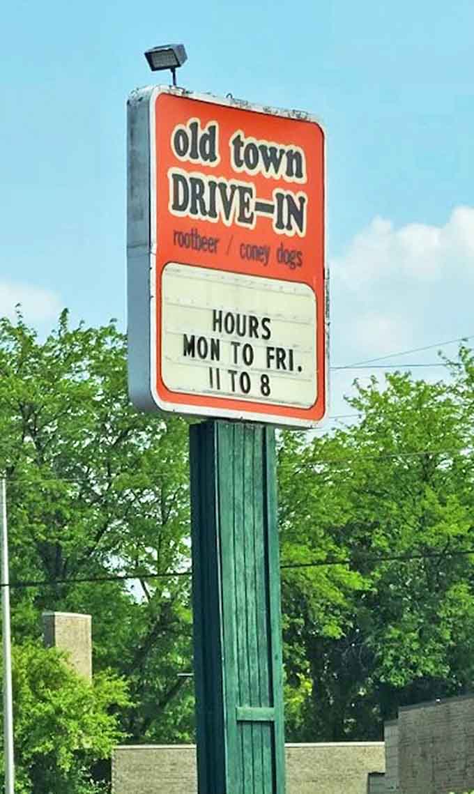 The roadside sign announces operating hours like a promise &ndash; Monday through Friday, 11 to 8, serving happiness in food form to hungry Michiganders.