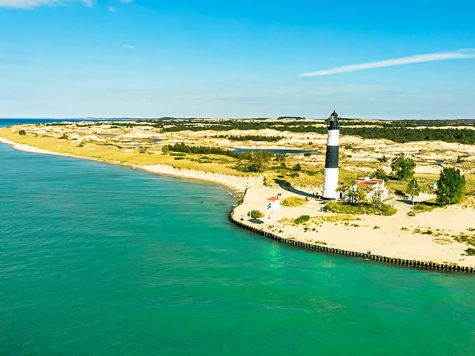 From above, Big Sable Point's strategic location becomes crystal clear, jutting into Lake Michigan where it could guide ships along this treacherous stretch of shoreline.
