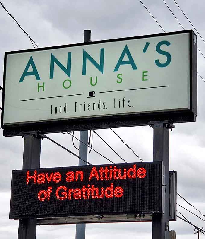 The Anna's House sign promises exactly what awaits inside &ndash; good food, good friends, and a reminder to approach life with gratitude and appetite.