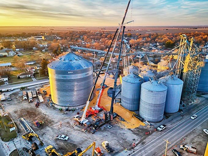 Grain silos under construction remind visitors that Arcola remains a working agricultural community, not just a quaint tourist destination with pretty buildings.