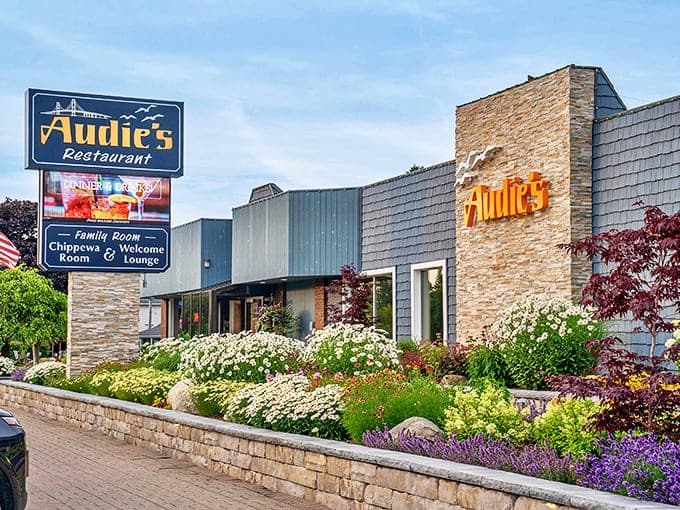 Beautiful landscaping frames this culinary landmark, where flowers bloom as colorfully as the flavors waiting inside.