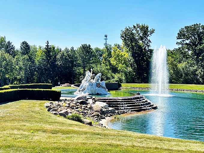This tranquil water feature creates the perfect foreground for contemplating the temple's beauty, with sculptural elements adding classical elegance to the scene.