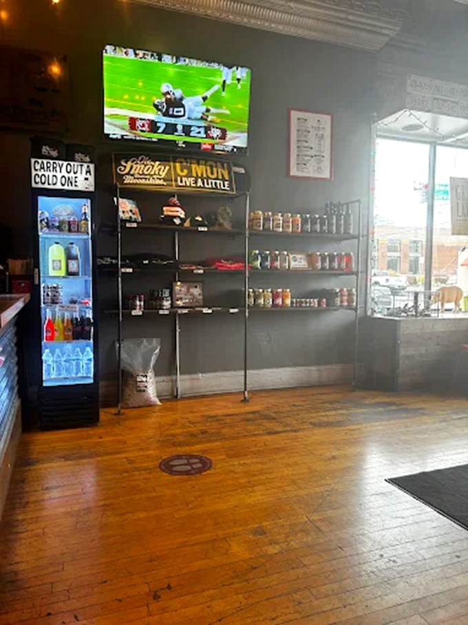 The beverage wall: where craft sodas, local beers, and house moonshine wait patiently to wash down your barbecue feast.