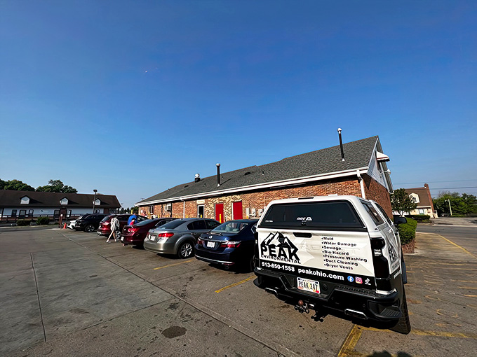 A full parking lot at a donut shop is the universal sign that something delicious is happening inside.