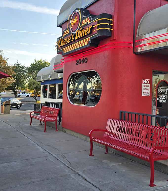 Even the exterior benches invite you to slow down and savor the experience, red and welcoming like the entire establishment.