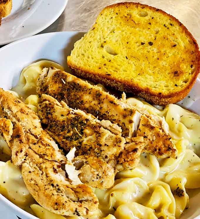 This chicken alfredo isn't just pasta &ndash; it's comfort in a bowl, where perfectly cooked noodles swim in a creamy sea of "everything's going to be alright."