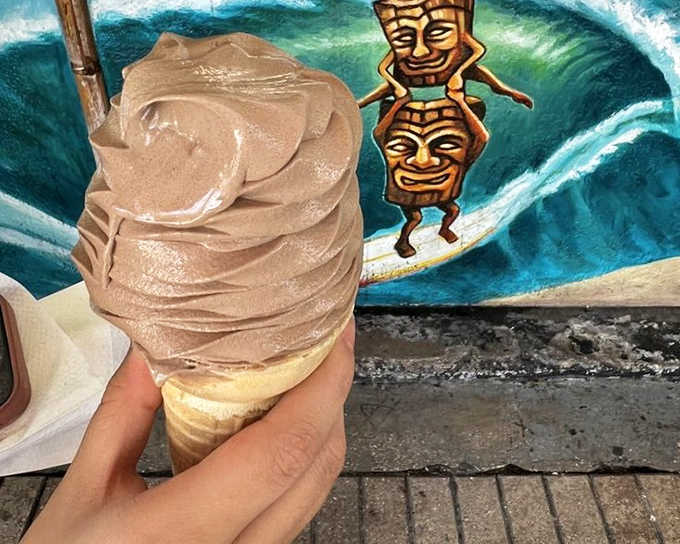 Chocolate soft serve swirled to towering perfection. This isn't just dessert&mdash;it's an engineering marvel that demands respect (and quick eating before gravity wins).