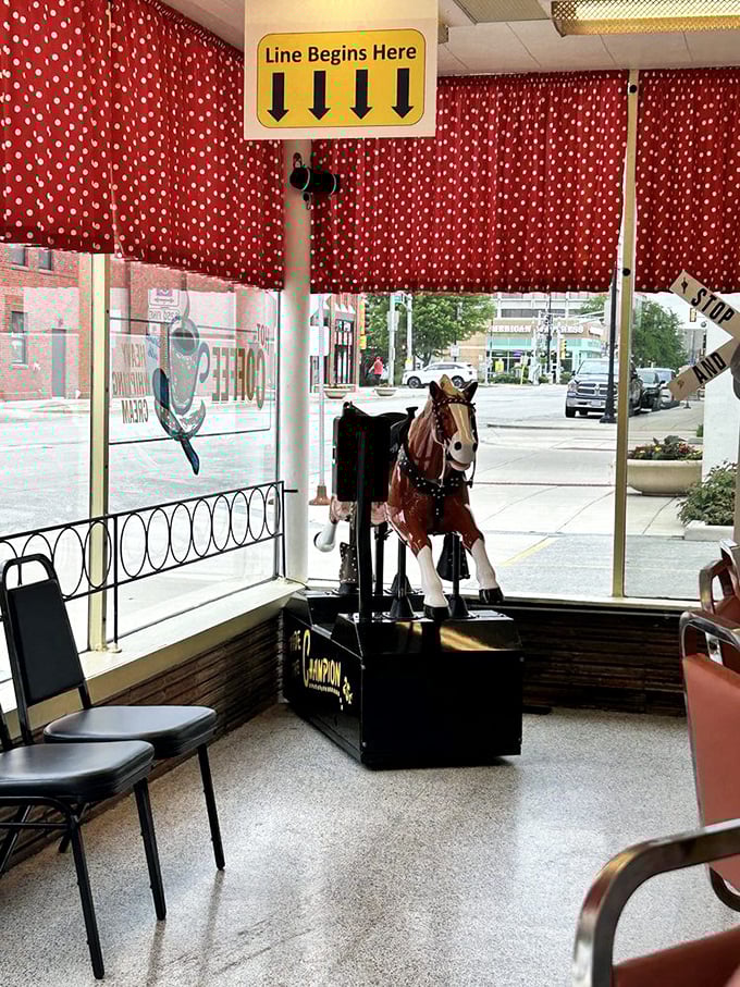 Coin operated ride: The mechanical horse stands sentinel by the window, ready to transport the youngest diners on imaginary adventures for just a quarter.