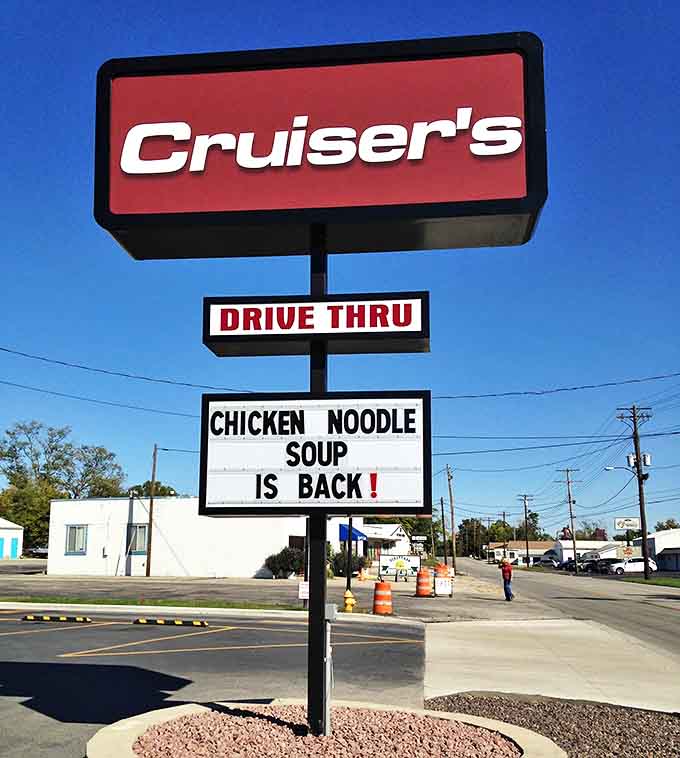 The sign that stops traffic – when "CHICKEN NOODLE SOUP IS BACK" qualifies as breaking news worth changing lanes for. Seasonal announcements treated with appropriate reverence.