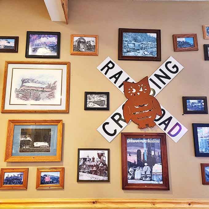 Railroad memorabilia transforms walls into a museum of locomotive history, creating an immersive atmosphere that celebrates train culture.