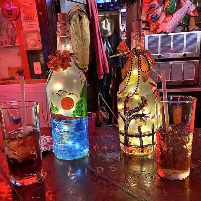 Hand-painted decorative bottles add splashes of folk art charm to a space already overflowing with visual interest and quirky character.