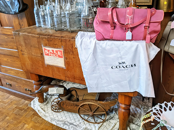 This antique press isn't just a tool – it's a mechanical marvel from an era when craftsmanship meant creating beauty even in everyday objects.