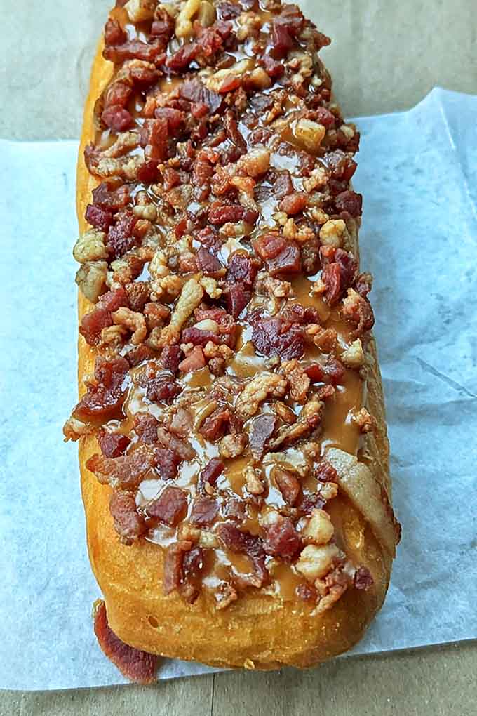 The breakfast rebel &ndash; a maple-glazed long john topped with crispy bacon bits that boldly crosses the sweet-savory border.