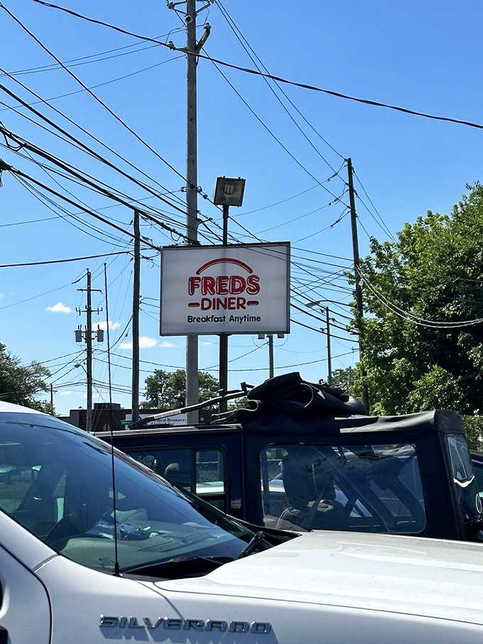 The Fred's Diner sign stands as a beacon for breakfast lovers, promising "Breakfast Anytime" – words that warm the heart of late risers everywhere.