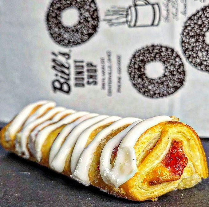 Fruit Strudel: Flaky pastry cradles sweet fruit filling, topped with delicate icing that melts on your tongue like edible sunshine.