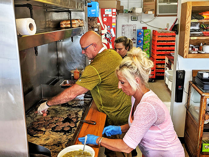 The heart of Crabill's operation &ndash; a well-seasoned flat top where burger patties sizzle to perfection. Some say the soul of the place lives in this grill.
