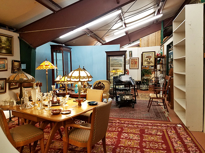 Tiffany-style lamps cast kaleidoscope patterns across this dining vignette, turning a simple meal into a stained-glass experience.