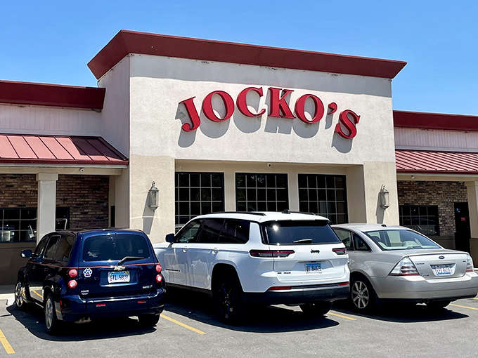 The Jocko's exterior stands proud in the Illinois sunshine, its red-trimmed façade a beacon of hope for empty stomachs for miles around.
