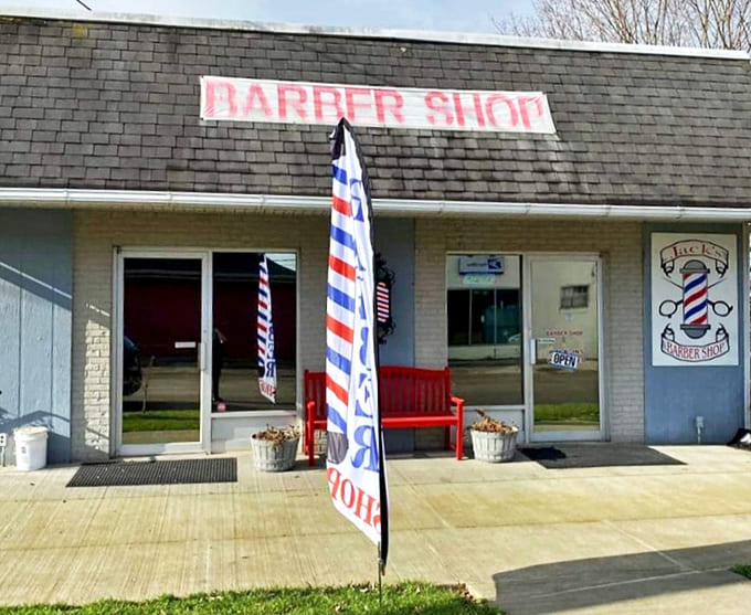 Kingston's barber shop, with its classic striped pole and welcoming bench, offers haircuts with a side of community news and friendly debate.