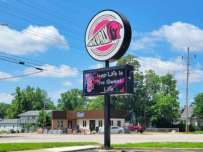 That iconic sign stands tall like a lighthouse for dessert lovers, guiding them to sweet salvation since 1976 with unmistakable charm and promise.