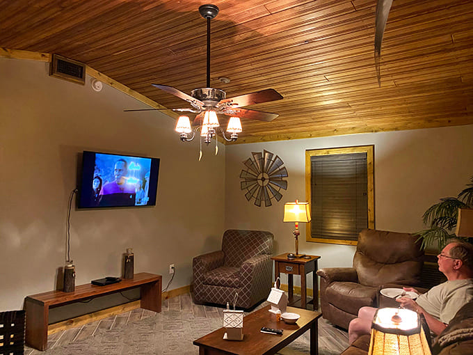 Evening entertainment comes in the form of comfortable seating, warm lighting, and whatever's playing on that flatscreen.