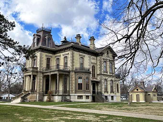 From this angle, the mansion's imposing silhouette commands attention, a limestone testament to Gilded Age prosperity and architectural ambition.