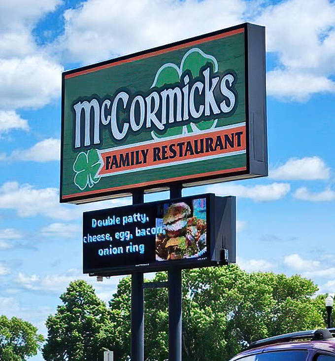 The McCormick's sign stands tall against Minnesota skies, the digital display below tempting passing drivers with burger specials that are impossible to resist.