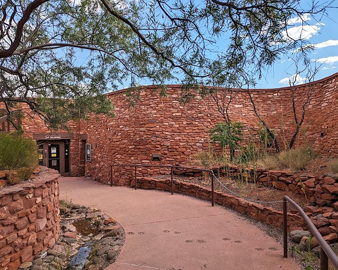 The Miller Visitor Center blends seamlessly into its surroundings, its rustic stonework echoing the natural formations that made Sedona famous.