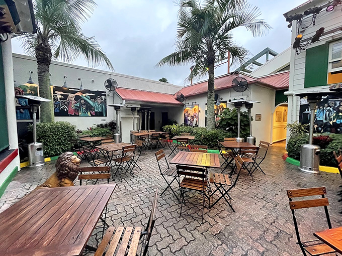 The outdoor courtyard offers al fresco dining under Florida skies, where palm trees and good company create the perfect island atmosphere.