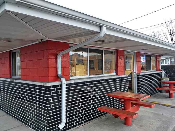 Red picnic tables offer al fresco dining with a side of nostalgia &ndash; simple pleasures that remind us why some traditions deserve to be preserved forever.