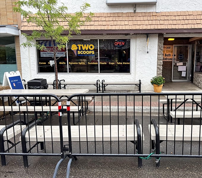 Outdoor seating at Two Scoops offers the perfect spot to people-watch while racing to finish your cone before gravity wins.