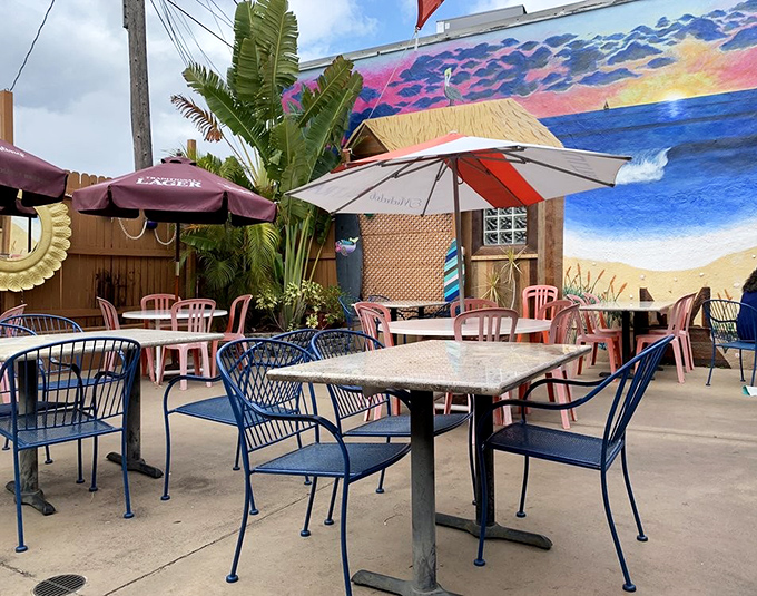 Umbrella-shaded tables offer respite from Florida's sunshine, perfect for savoring seafood without becoming lobster-colored yourself.