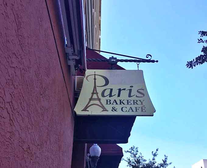 The café's sign promises a taste of Paris – and unlike most promises made on street corners, this one actually delivers.