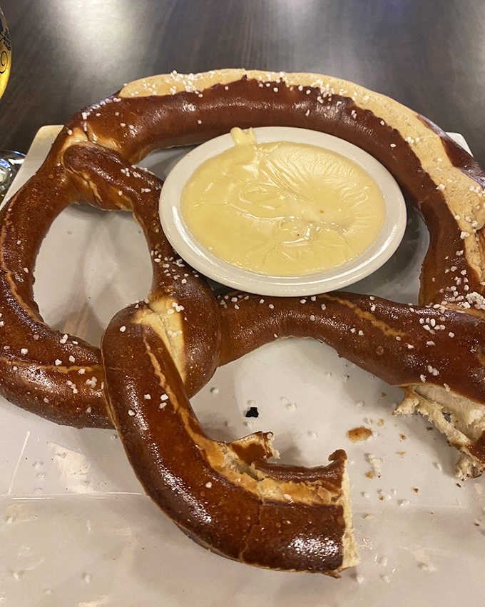 The giant pretzel arrives looking ready for its own Instagram account – a twisted creation with beer cheese for dipping that demands sharing.