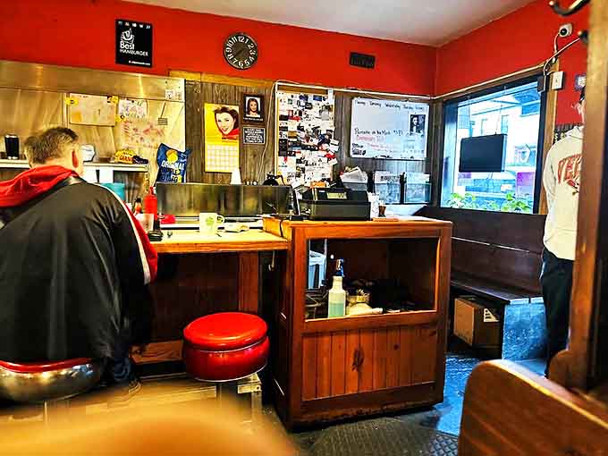 The heart of operations &ndash; where orders are called, checks are tallied, and the magic of diner economics happens one coffee refill at a time.