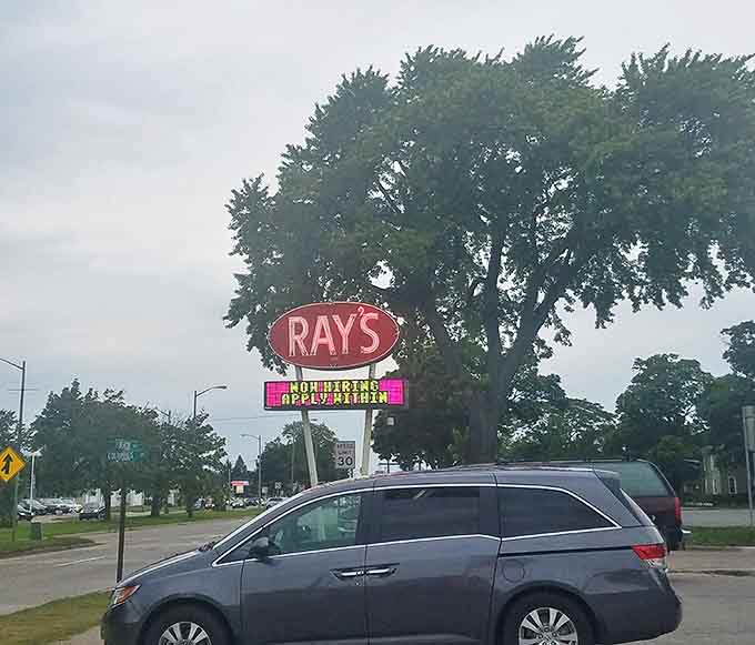 A beacon for burger enthusiasts &ndash; Ray's iconic sign has guided hungry travelers to flavor salvation for decades.