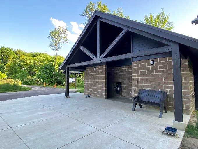 Even the restroom facilities blend harmoniously with nature &ndash; proving that when architects respect their surroundings, even necessities become noteworthy.