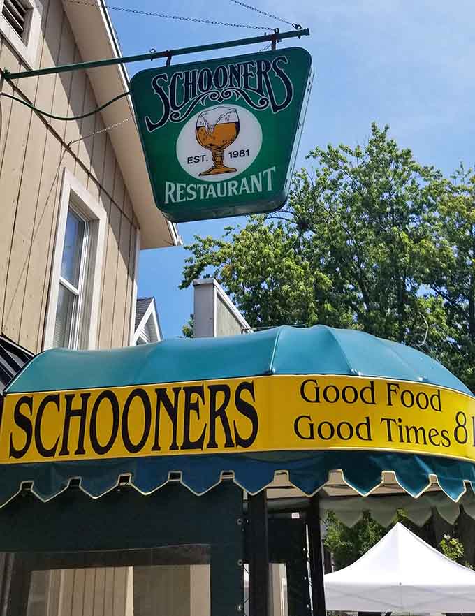 The cheerful signage promises "Good Food Good Times," a simple pledge that Schooners has been delivering on for over four decades.