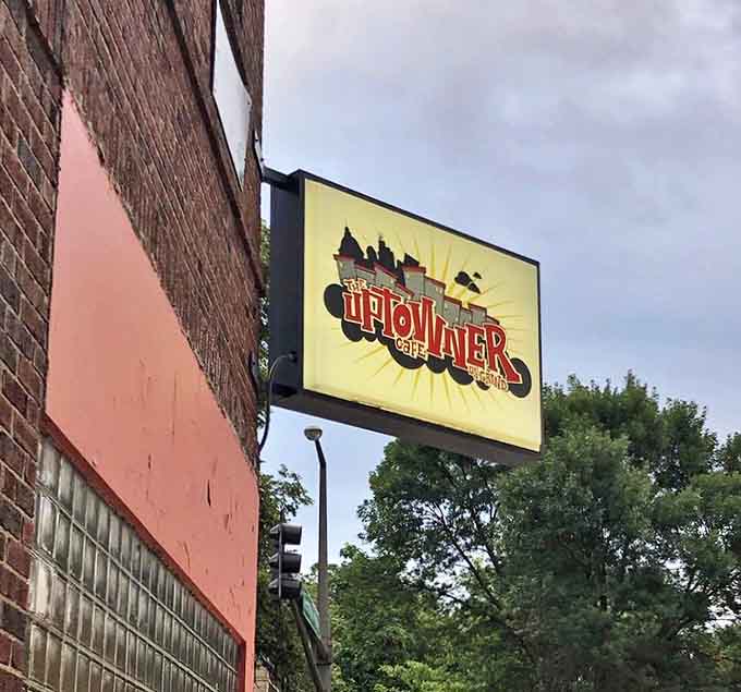 The iconic Uptowner sign stands as a beacon for breakfast lovers, promising potato perfection and coffee that keeps flowing.