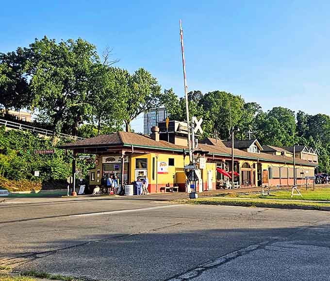 The exterior view showcases the station's historic architecture, where trains once departed and pizza lovers now arrive hungry for experience.