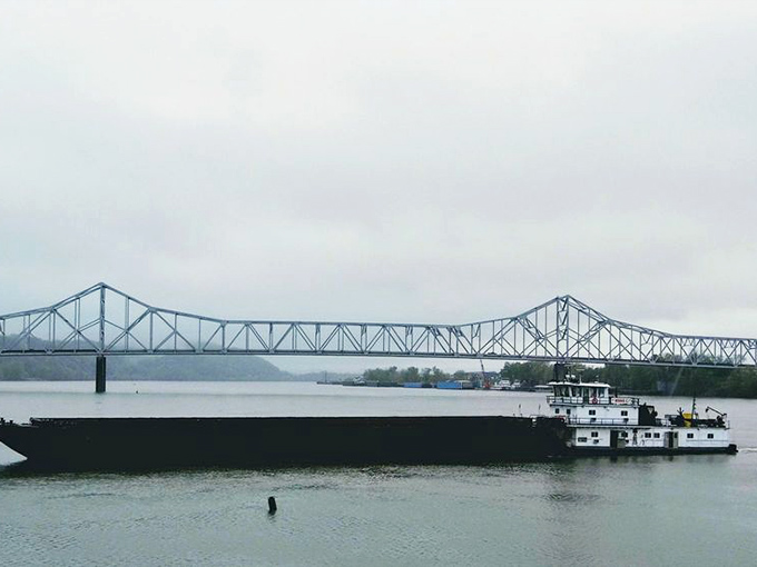 The Silver Memorial Bridge spans the Ohio River like a steel rainbow, connecting Ohio to West Virginia while barges navigate the waterway that gave Gallipolis its reason for being.