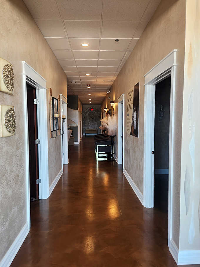 The path to wellness is lined with soothing neutrals and thoughtful design in this corridor that connects various treatment rooms like a wellness highway.