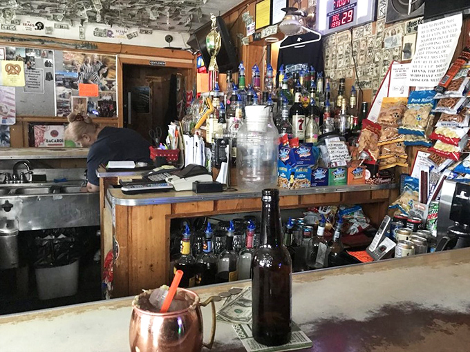 The full bar stands ready to serve whatever your heart desires, though locals know the Moscow Mule is the star of the show.