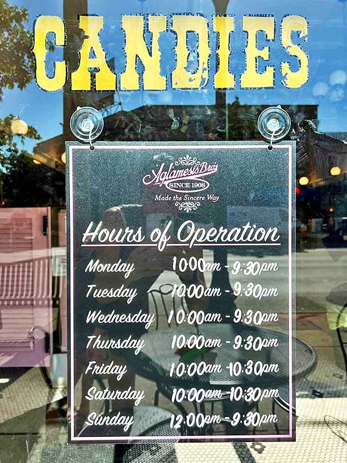 The hours of operation sign promises daily opportunities for joy &ndash; each visit a chance to taste tradition in its sweetest form.