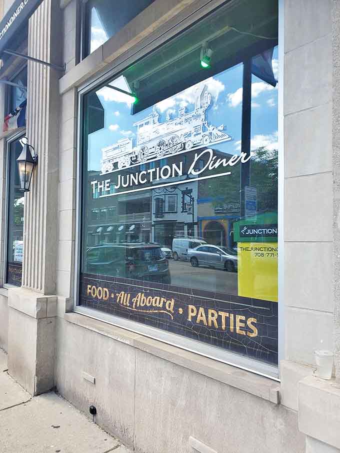 The storefront promises "Food, All Aboard, Parties" and delivers on every single word&mdash;your table is waiting, literally on the rails.