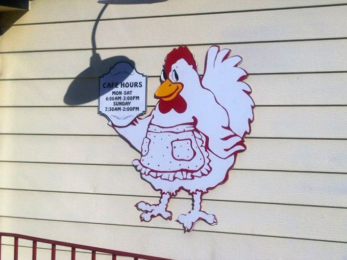 The chicken sign displaying hours &ndash; because even breakfast legends need to rest sometimes.