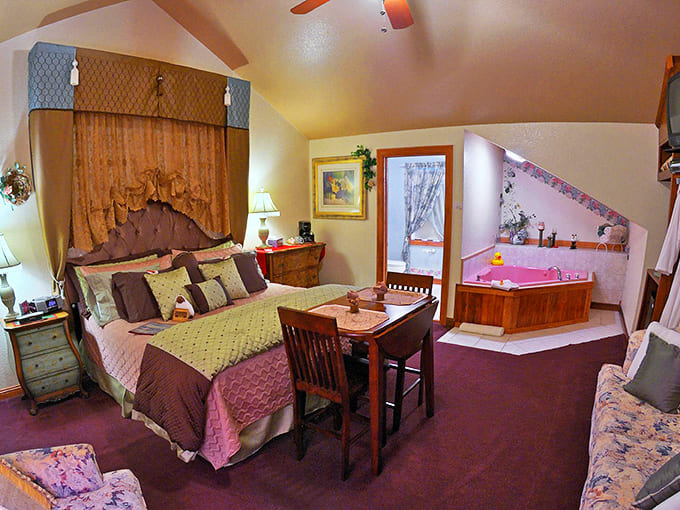 The Sunrise Suite offers spacious comfort with a touch of romance – note the jacuzzi tub tucked into the corner for ultimate relaxation.