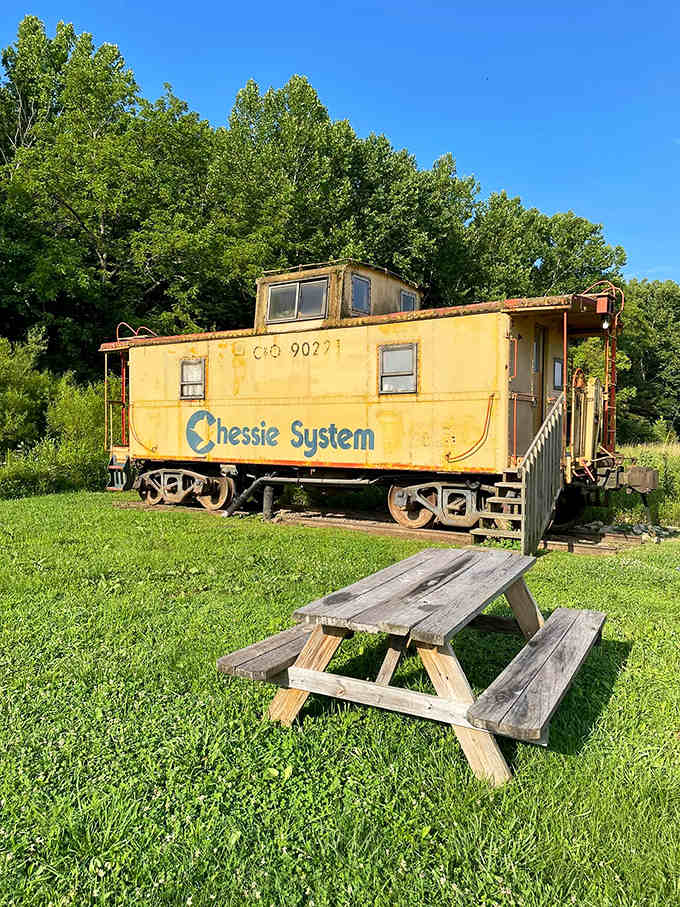 The humble picnic table becomes a five-star dining experience when surrounded by Ohio's natural beauty and caboose charm.